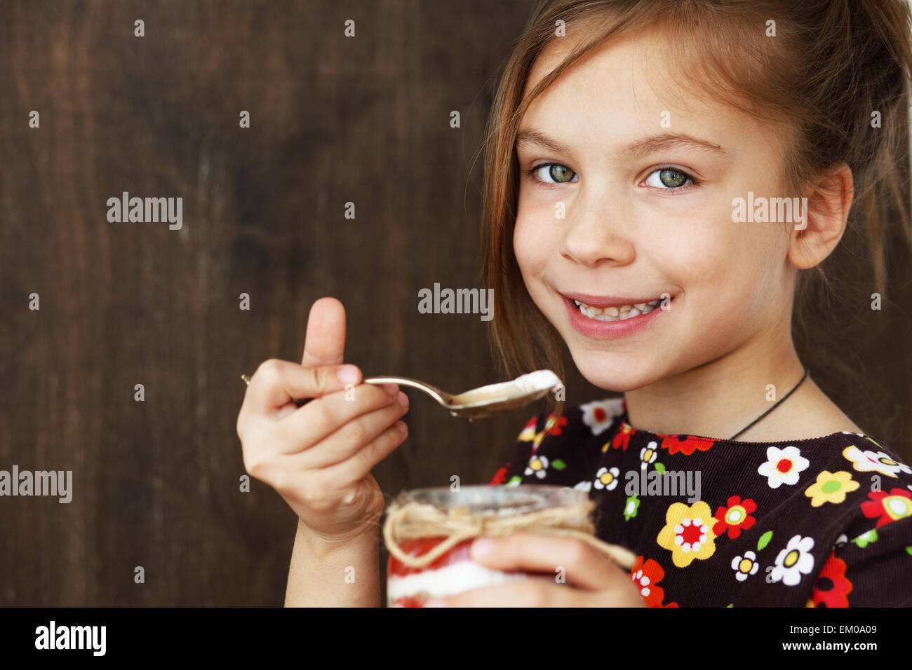 Child eating dessert Stock Photo - Alamy
