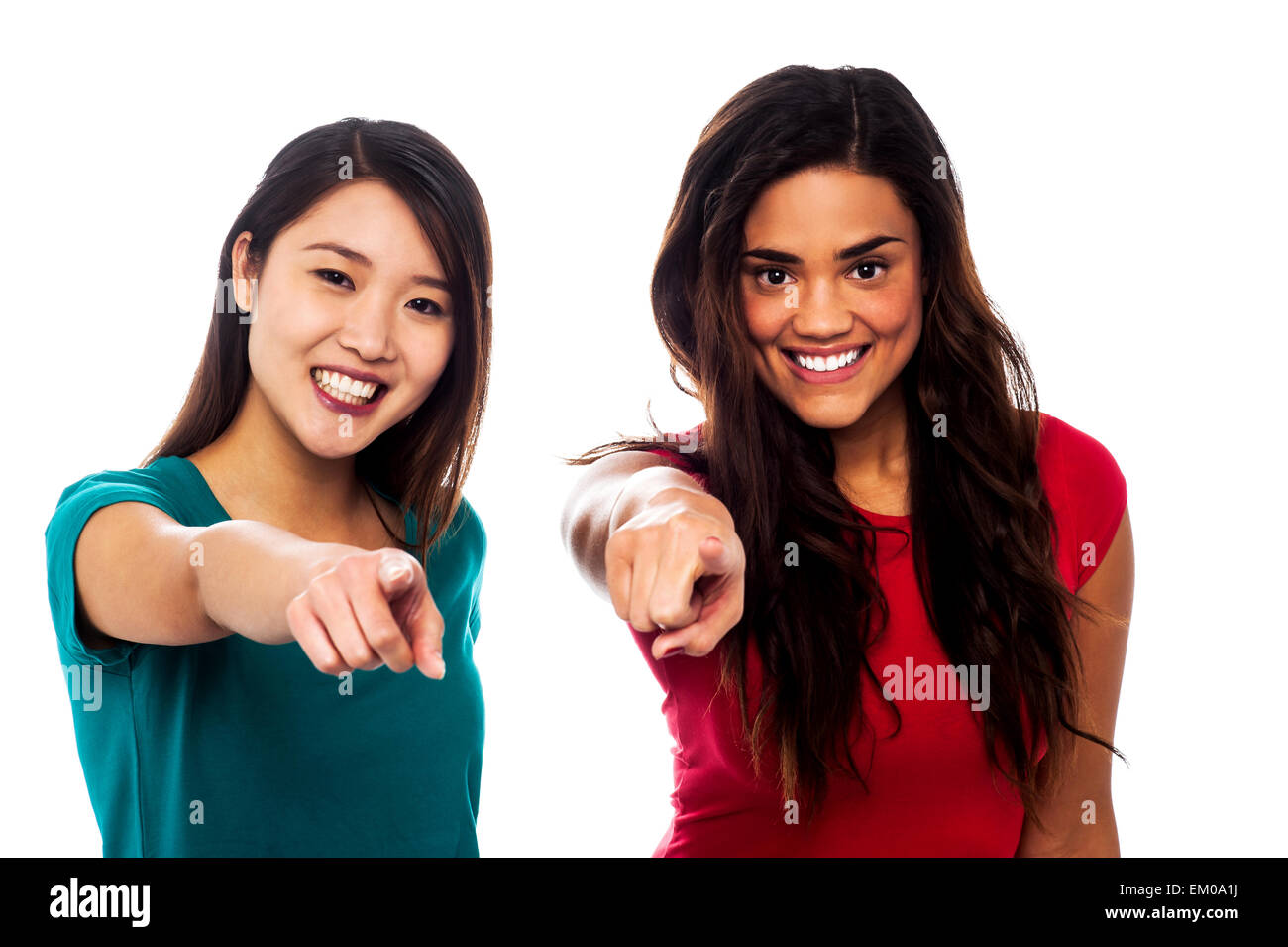 Pretty girls pointing finger towards you Stock Photo - Alamy