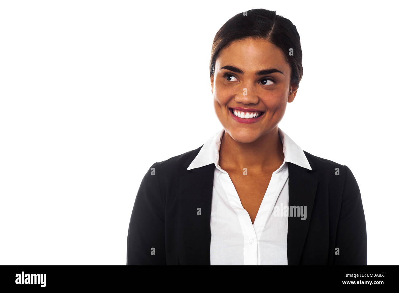 Corporate lady looking at something and smiling Stock Photo - Alamy