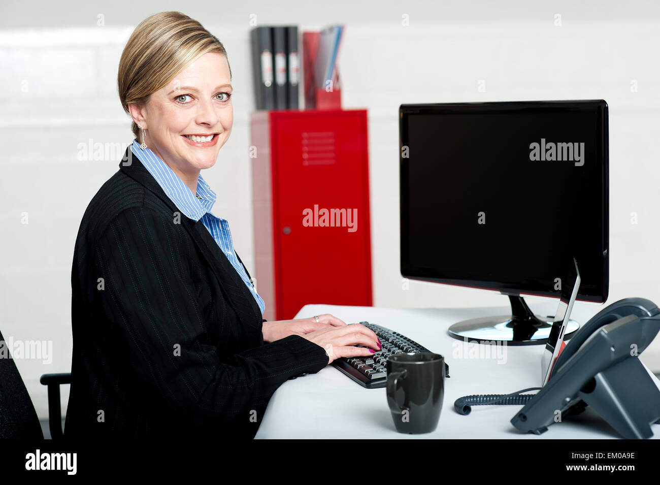 Attractive experienced secretary company sitting hi-res stock ...