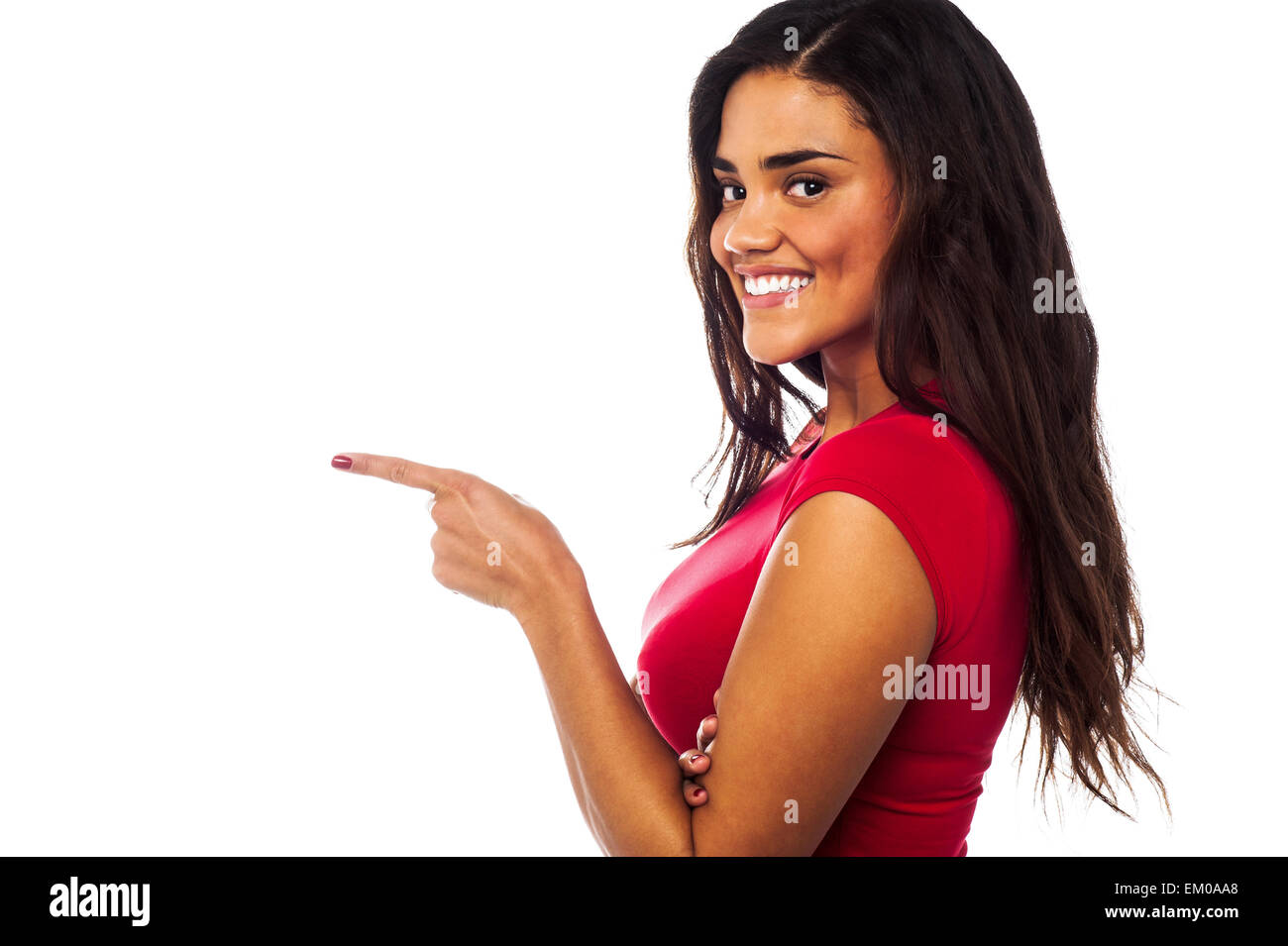 Pretty charming girl pointing away Stock Photo - Alamy