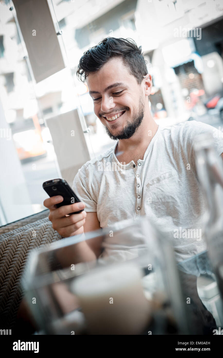 young stylish man in a bar Stock Photo - Alamy