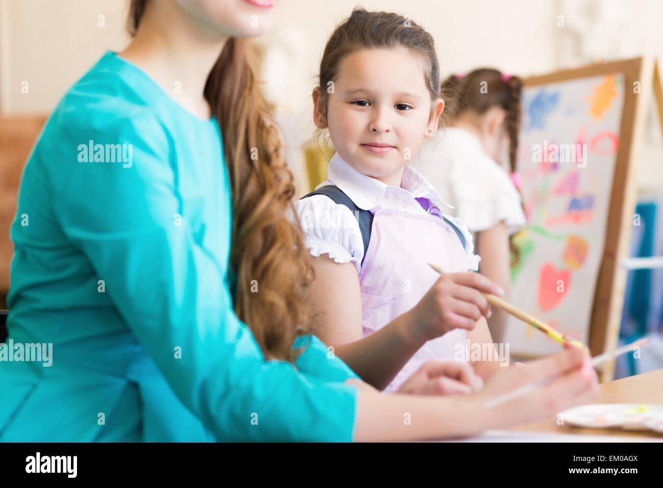 Children helping each other classroom hi-res stock photography and ...