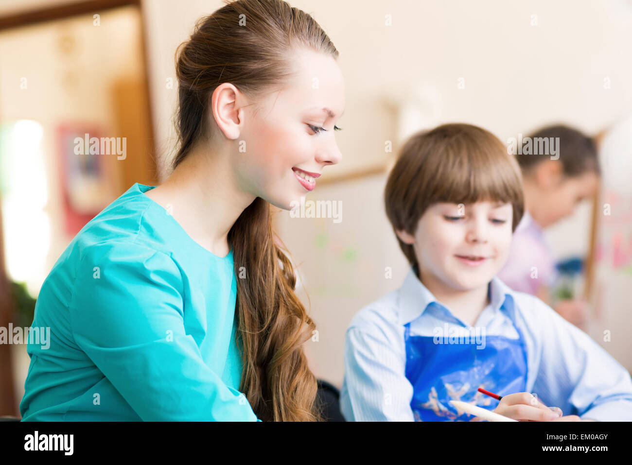 teacher and student in the classroom Stock Photo - Alamy
