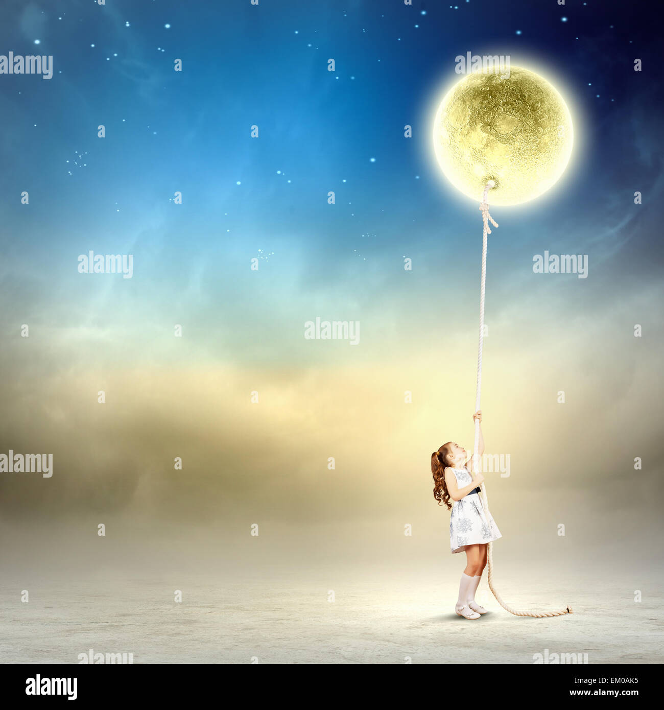 Little girl pulling moon Stock Photo - Alamy