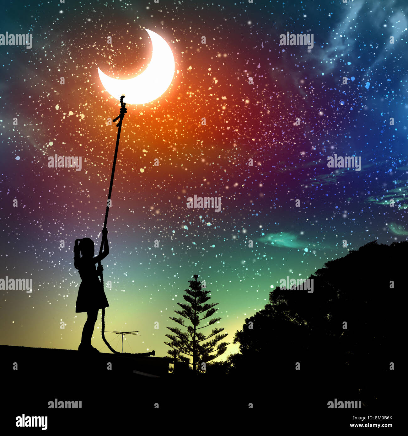 Little girl pulling moon Stock Photo - Alamy