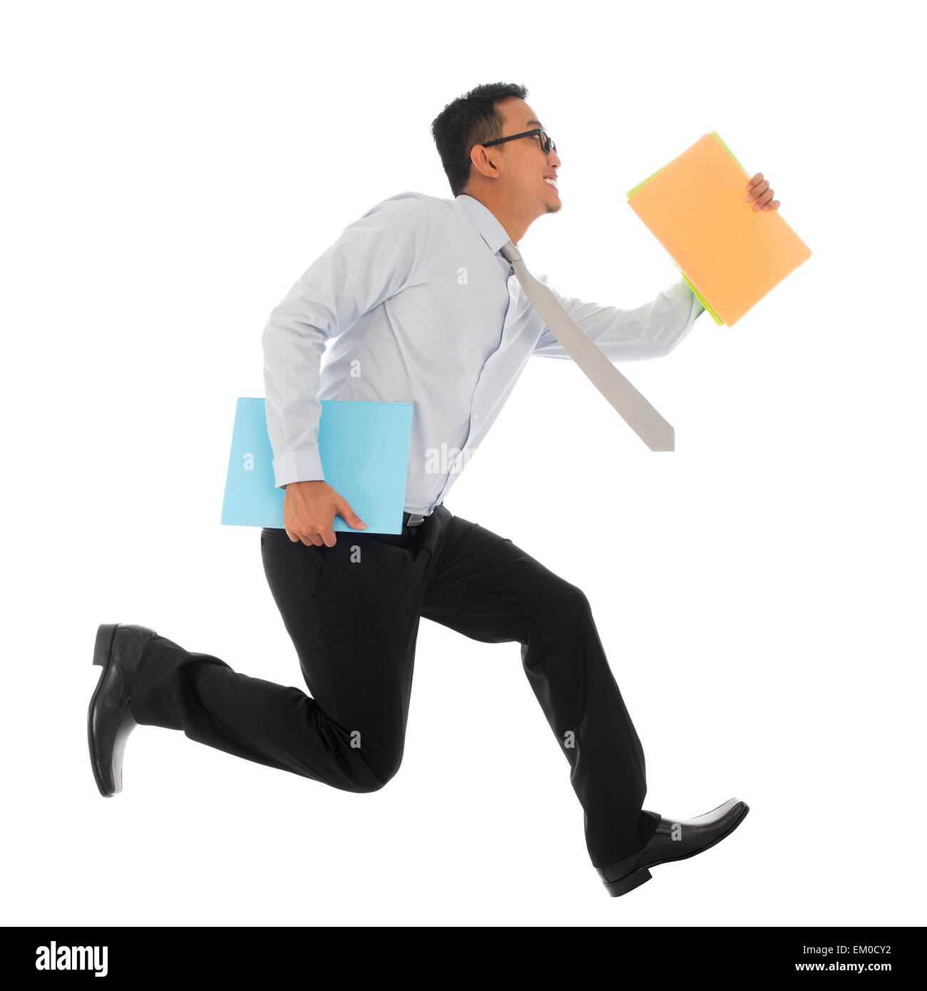Asian businessman in hurry running Stock Photo - Alamy