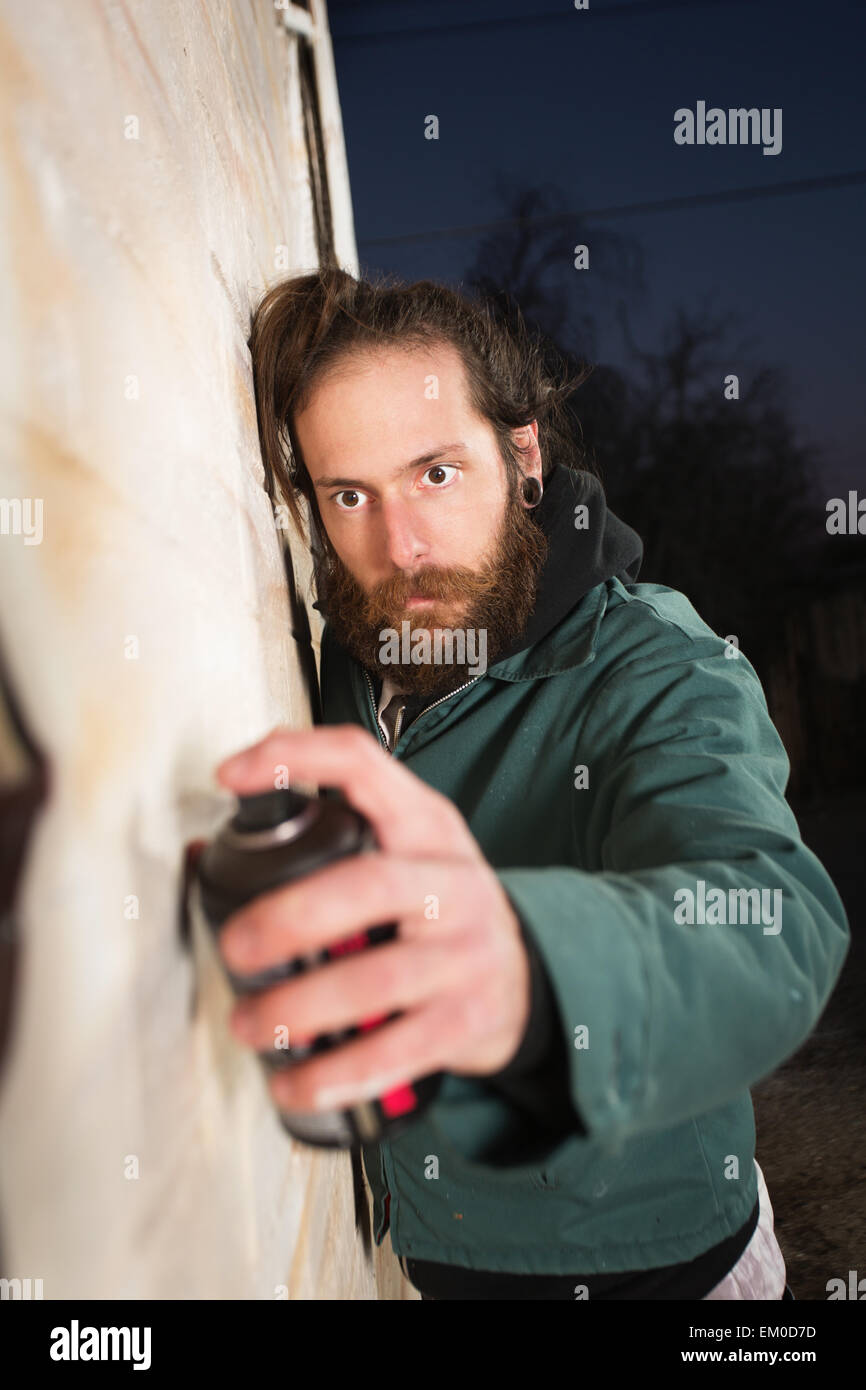 Man with Beard Spray Painting Stock Photo - Alamy