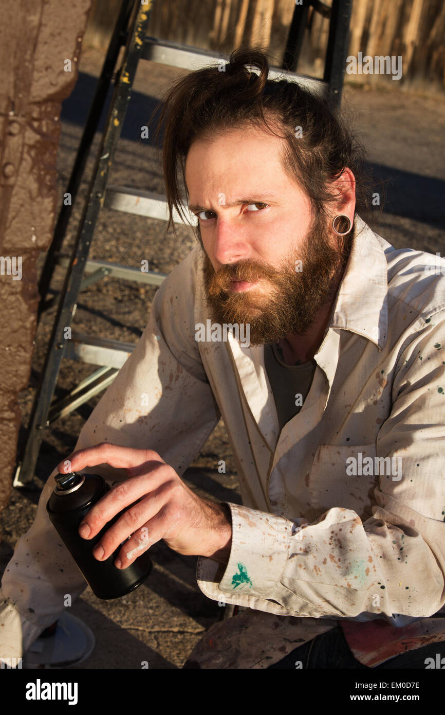 Single Spray Paint Artist Stock Photo - Alamy