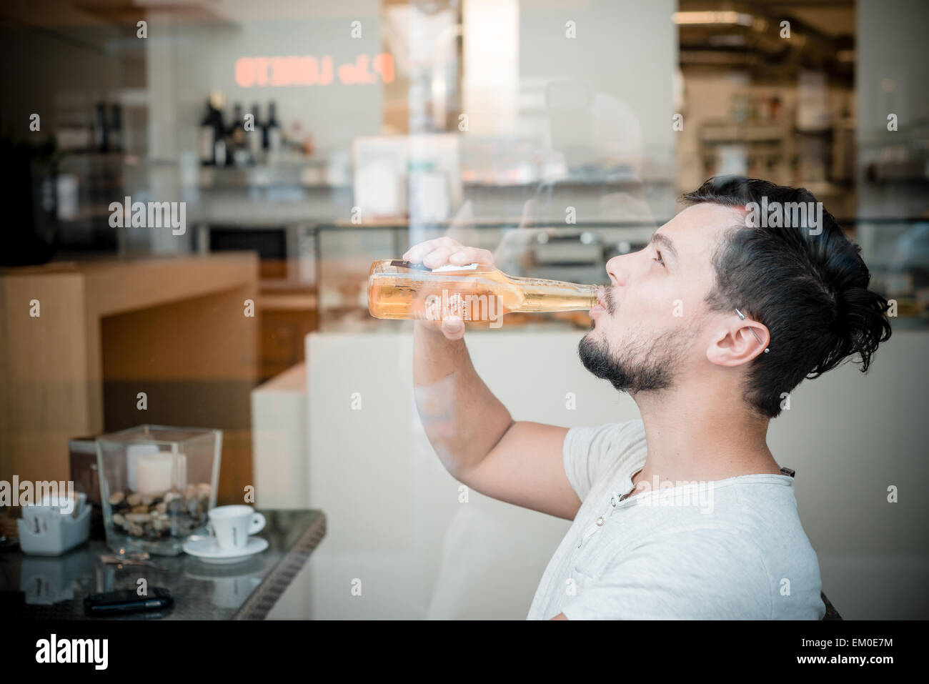 young stylish man in a bar Stock Photo - Alamy