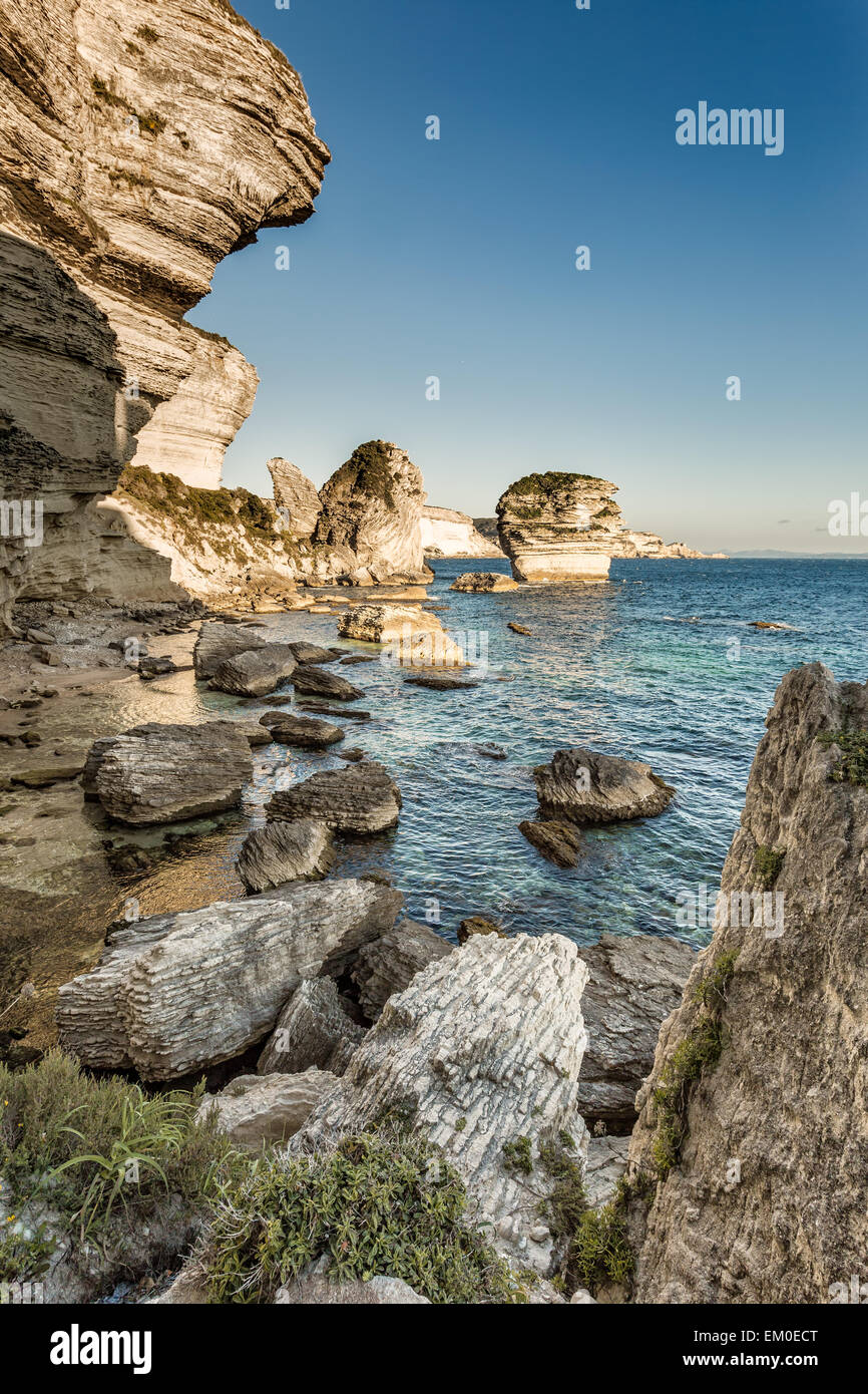 The towering white cliffs and stacks in the Mediteranean at Bonifacio ...