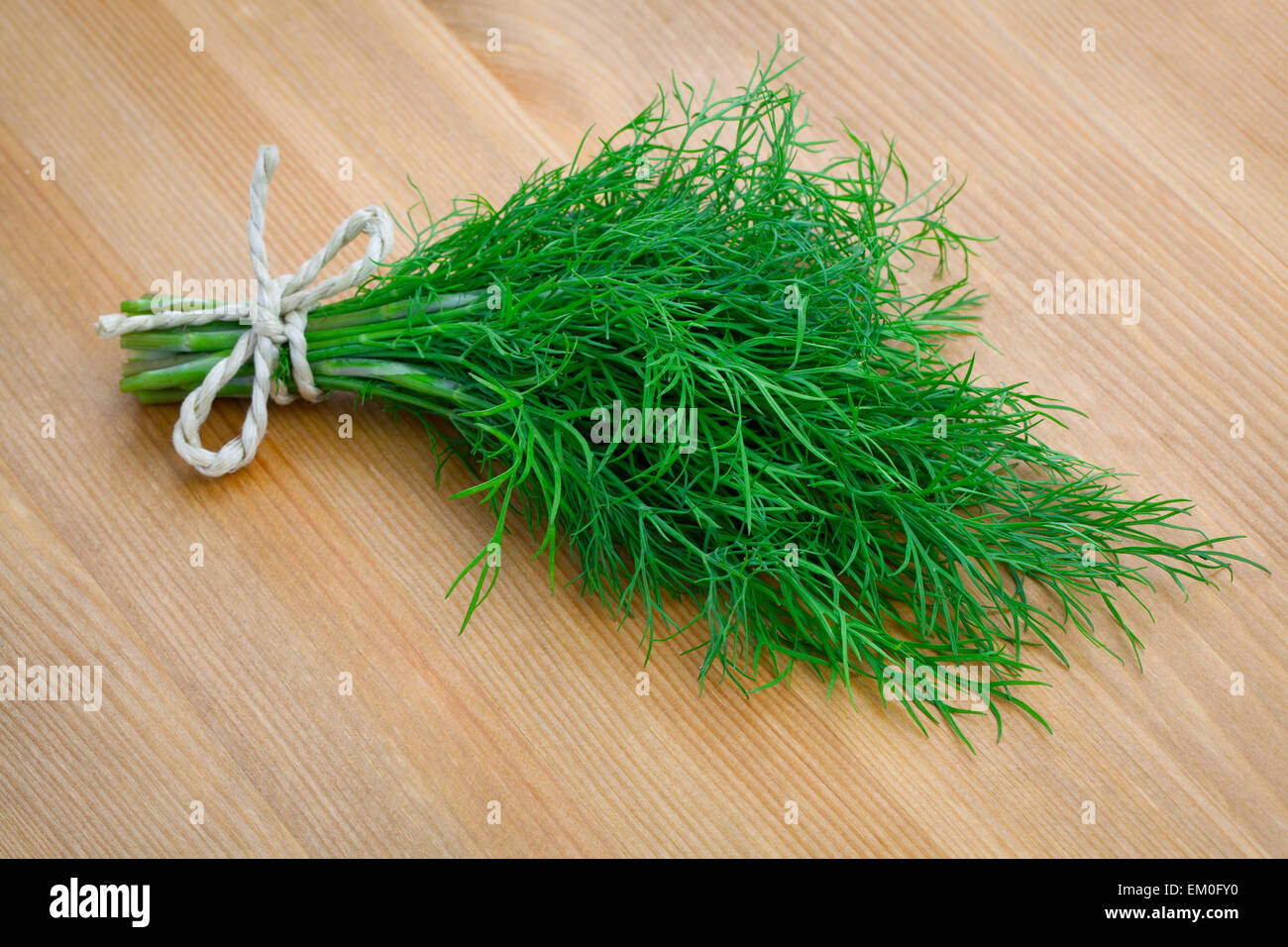 bunch fresh dill herb on wooden background Stock Photo - Alamy