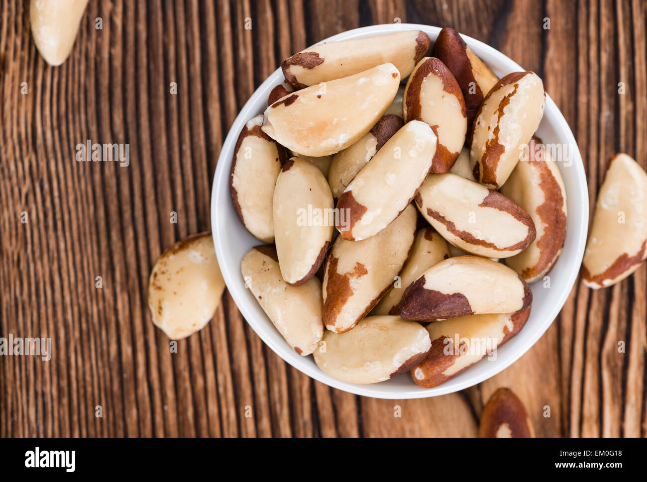 Heap of Brazil Nuts (close-up shot) on wooden background Stock Photo ...