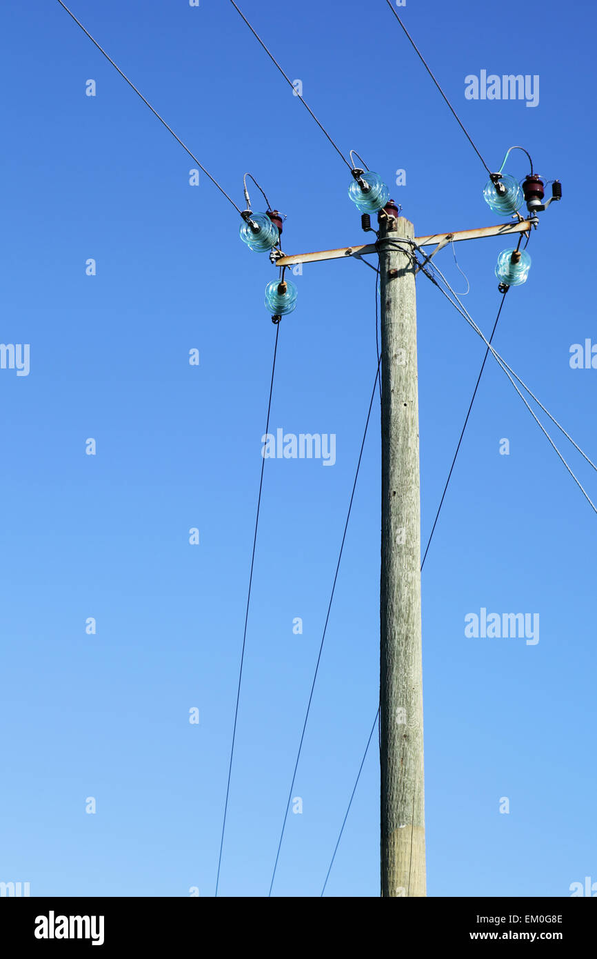 Powerline on wooden pillar Stock Photo - Alamy