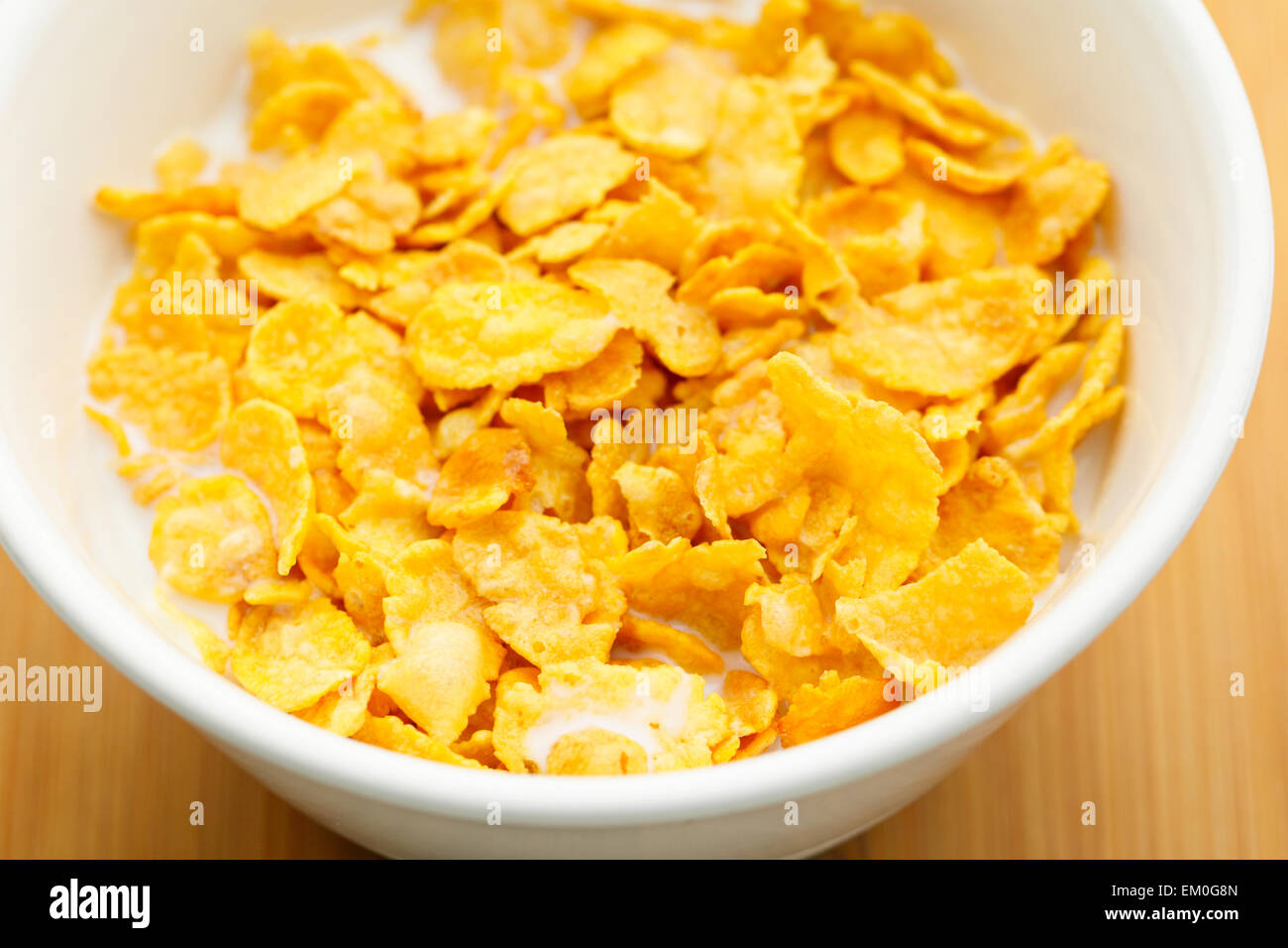 Corn flake in bowl Stock Photo - Alamy