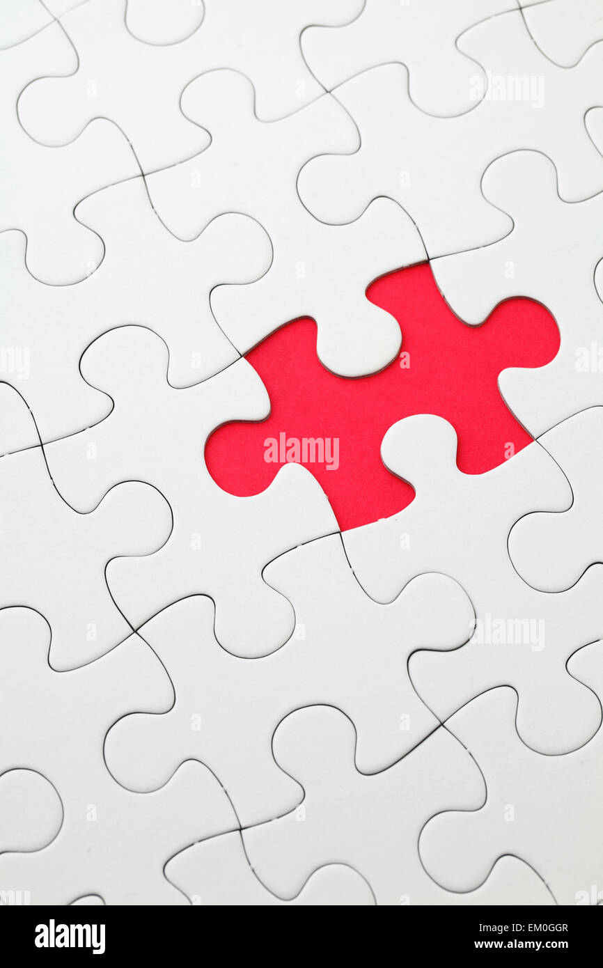 Missing puzzle piece in red color Stock Photo - Alamy