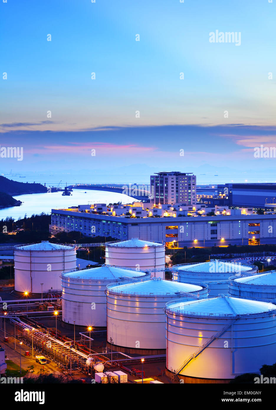 Oil storage tank at night Stock Photo - Alamy