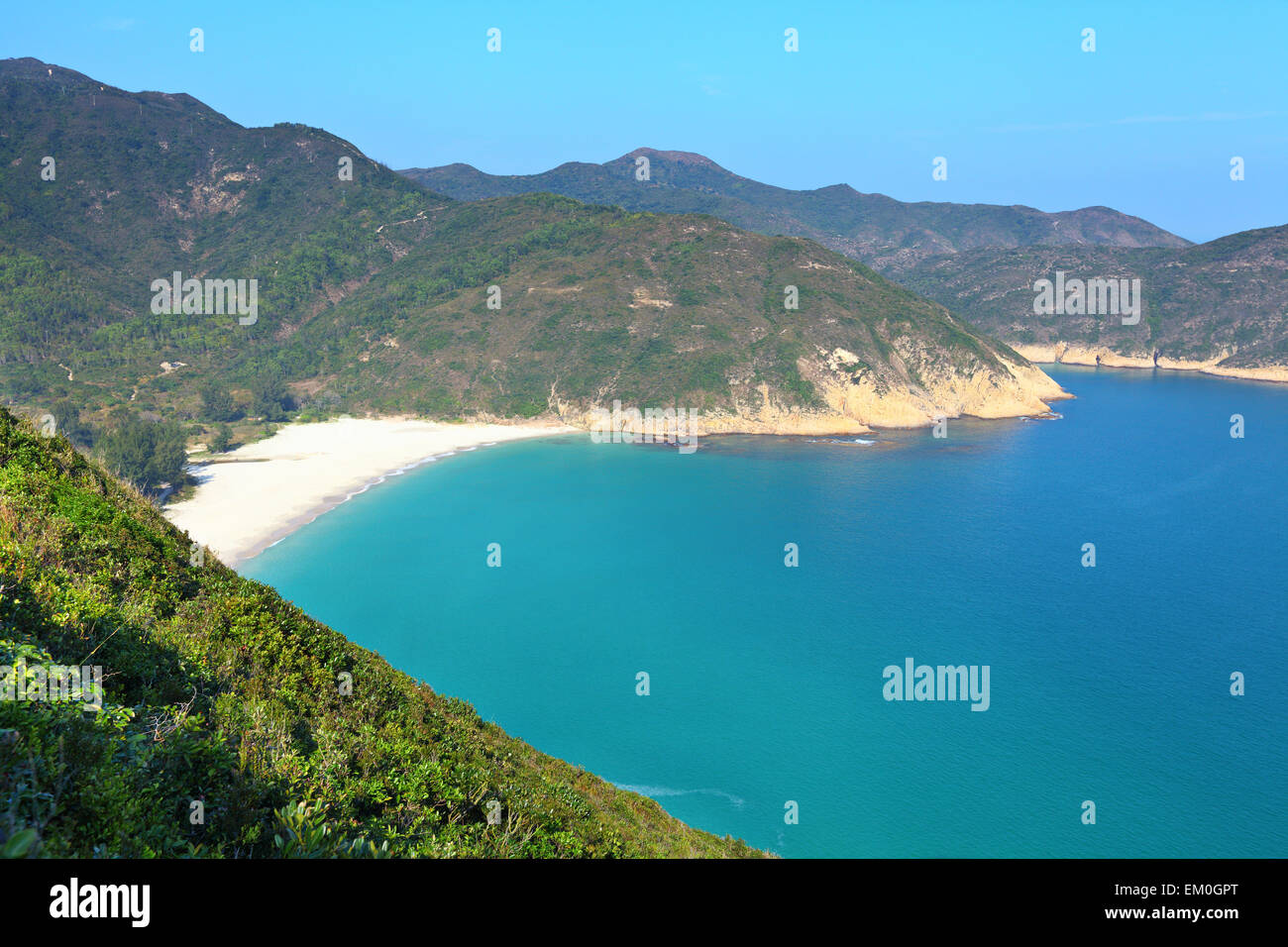 Island with beach and mountain Stock Photo - Alamy