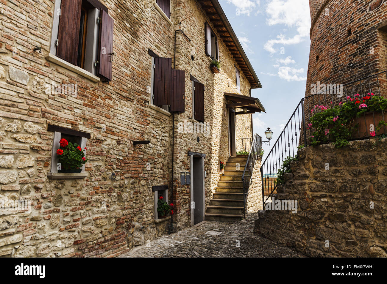 Narrow street in the old town in Italy Stock Photo - Alamy