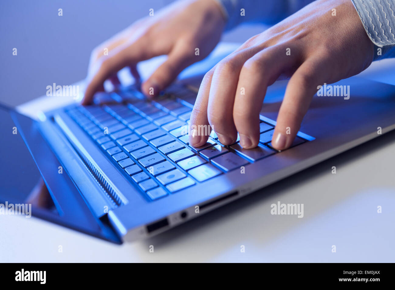 Click! Hands of a man on keyboard Stock Photo - Alamy