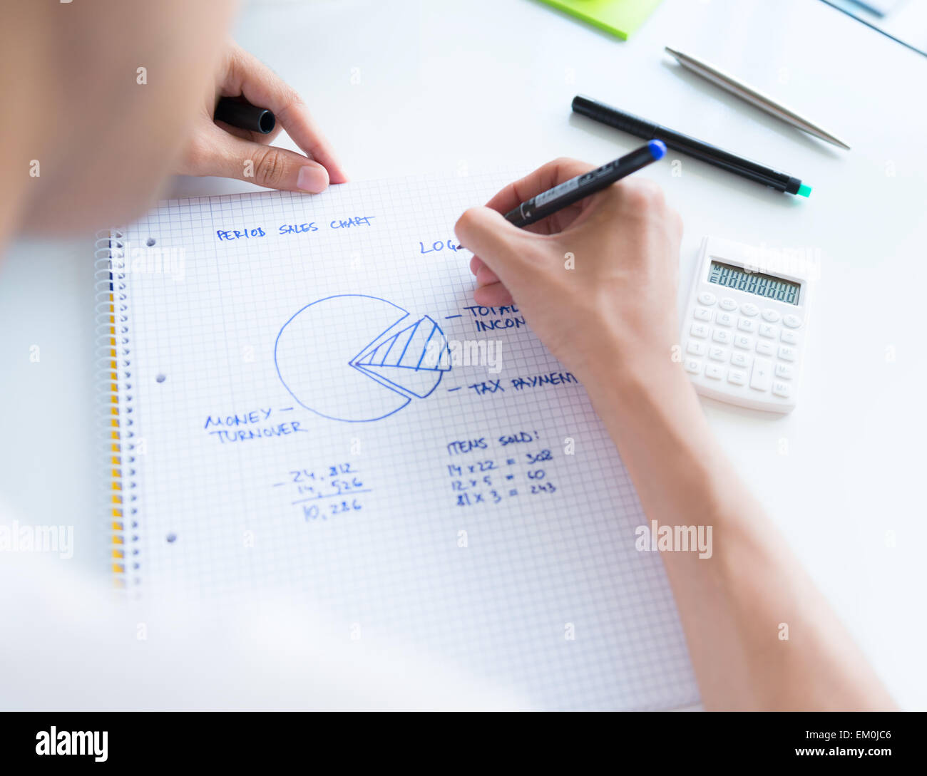 Calculating sales earnings Stock Photo - Alamy