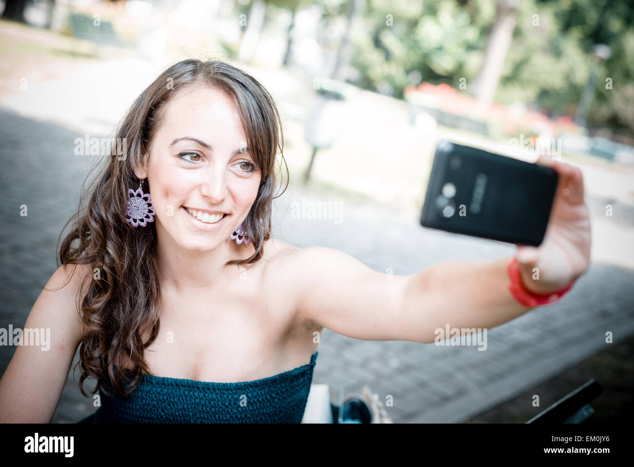 beautiful woman taking self-portrait Stock Photo - Alamy