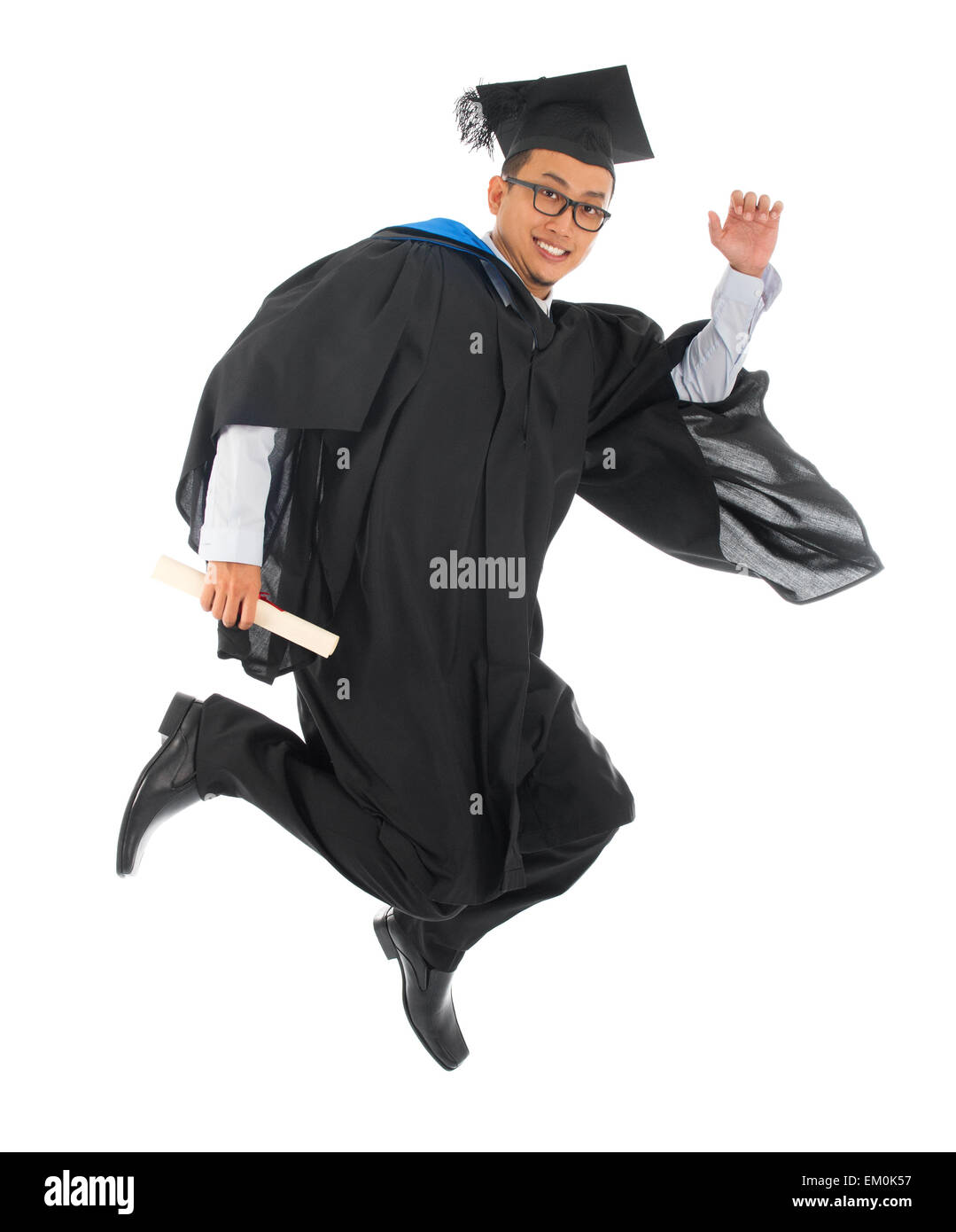 Student in graduation gown Cut Out Stock Images & Pictures - Alamy
