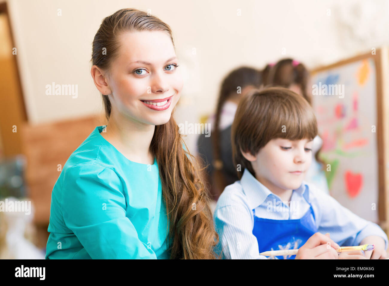 teacher and student in the classroom Stock Photo - Alamy