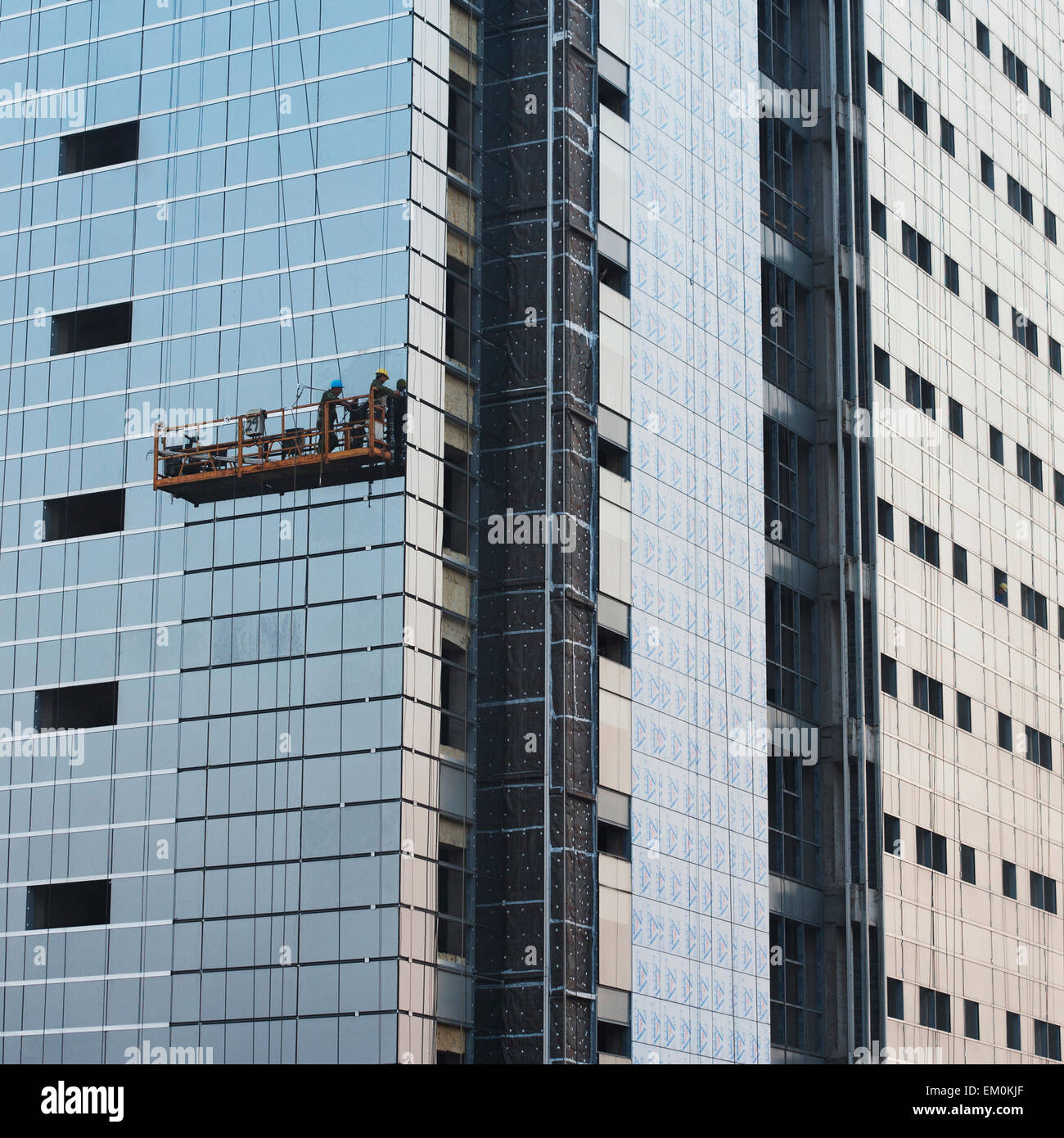Two window washers work hi-res stock photography and images - Alamy