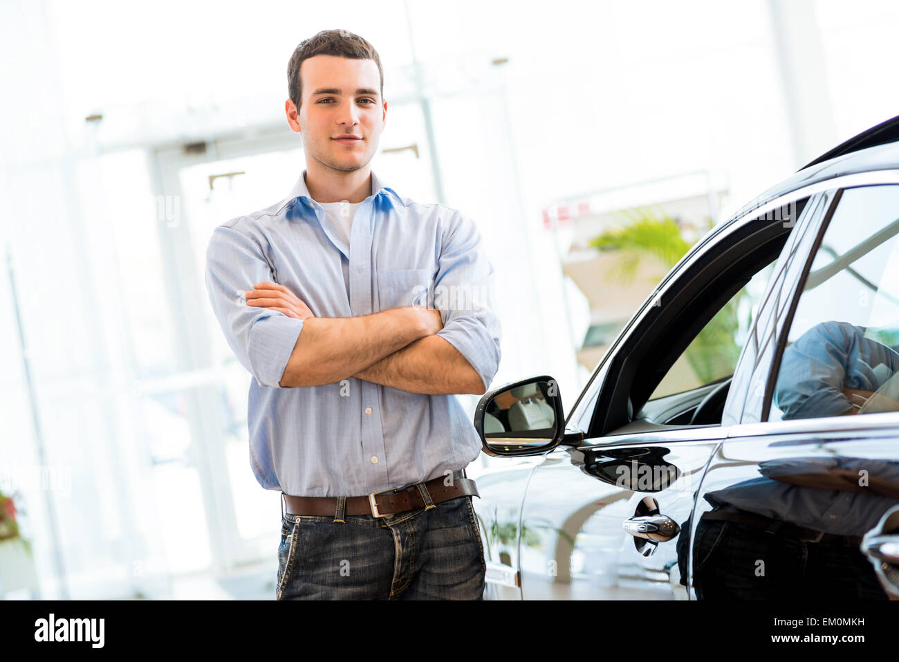 Auto driver standing arms crossed hi-res stock photography and images ...