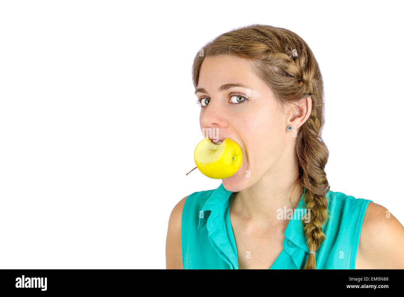 Girl taking bite apple apple hi-res stock photography and images - Alamy