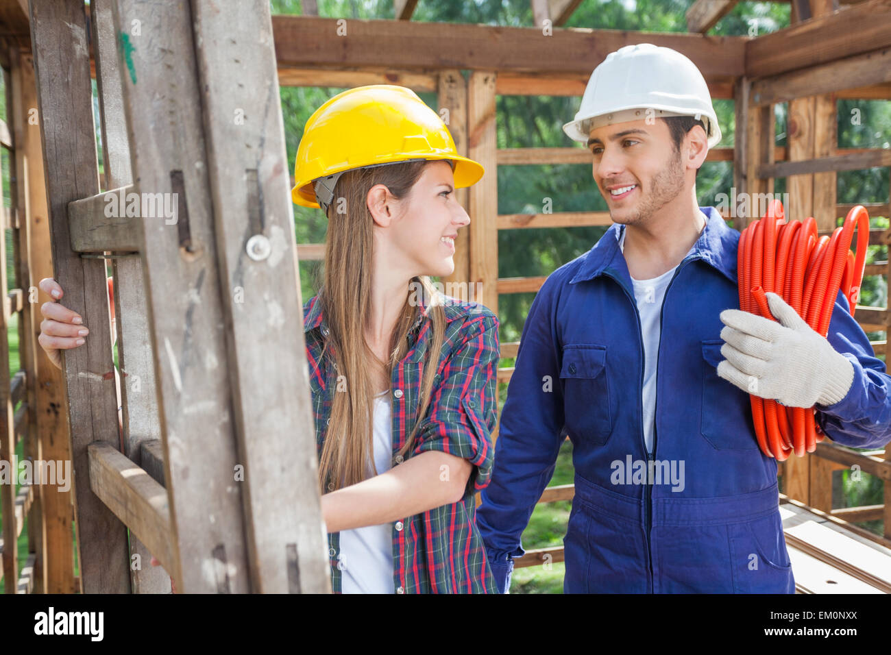 Smiling construction workers at site hi-res stock photography and ...