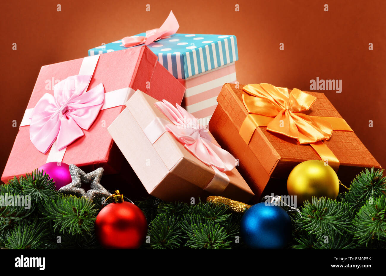 Colorful gift boxes and christmas tree Stock Photo - Alamy