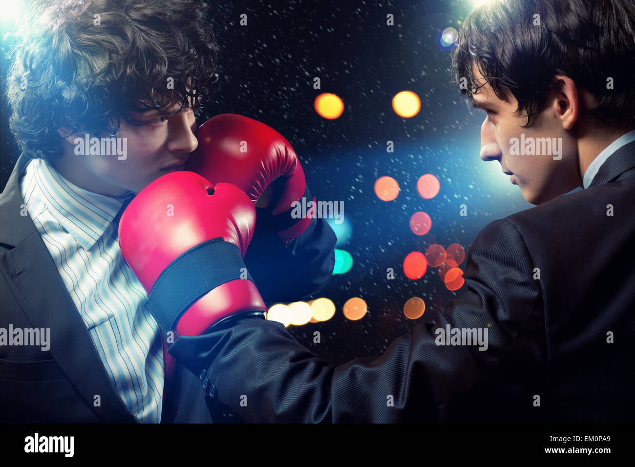 Two young businessman boxing Stock Photo - Alamy
