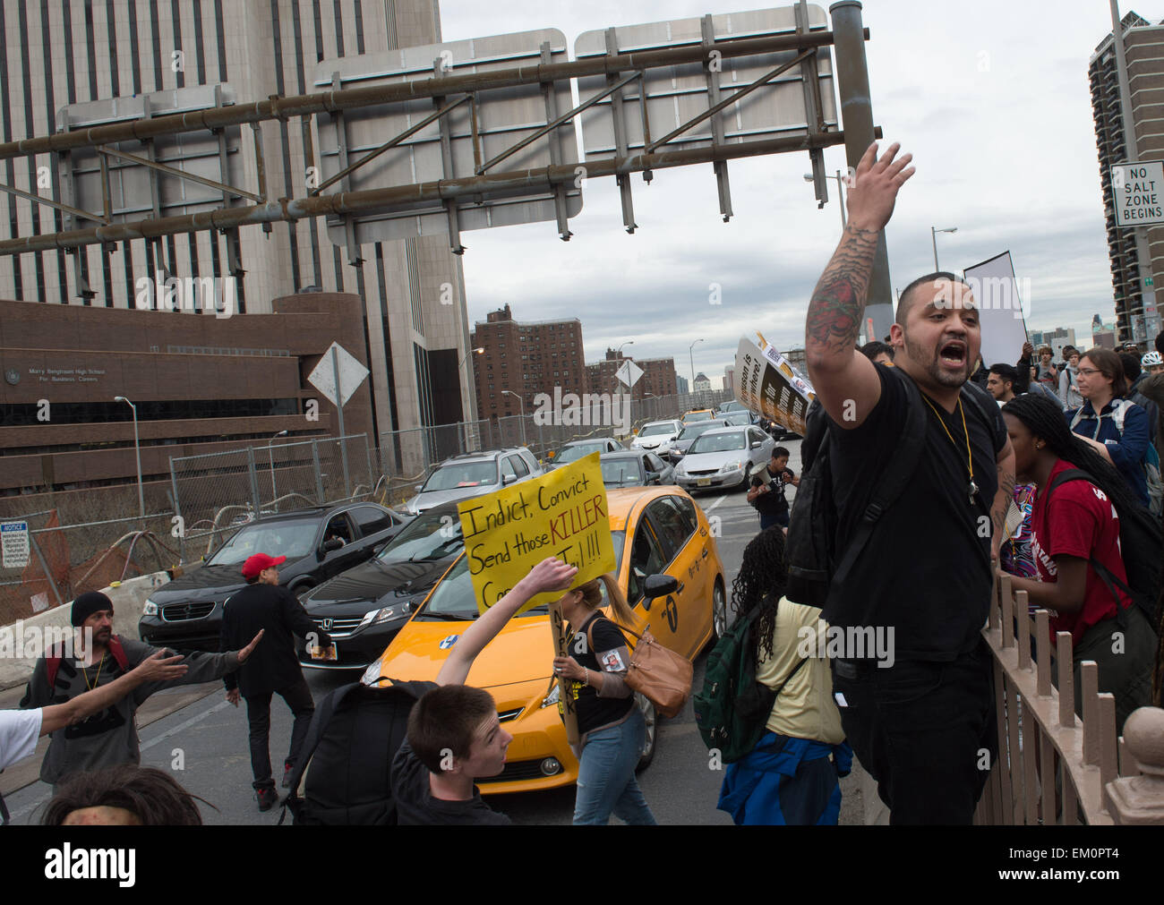 Manhattan, New York, USA. 14th Apr, 2015. Demonstrators swarm onto the ...