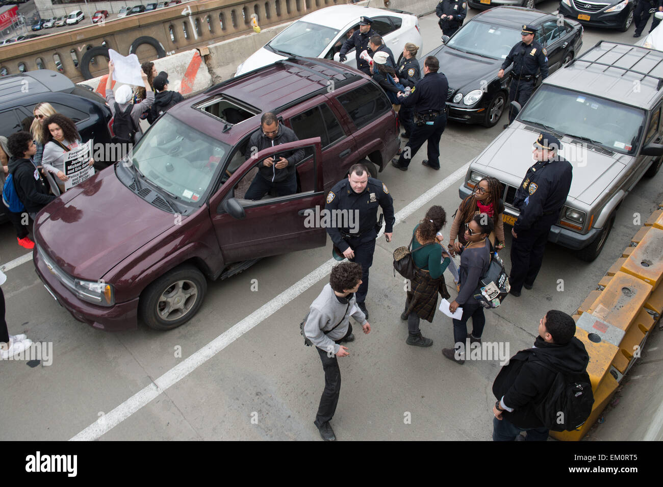 Manhattan, New York, USA. 14th Apr, 2015. Demonstrators are arrested on ...