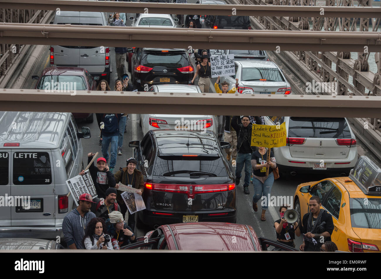 Manhattan, New York, USA. 14th Apr, 2015. Demonstrators swarm onto the ...