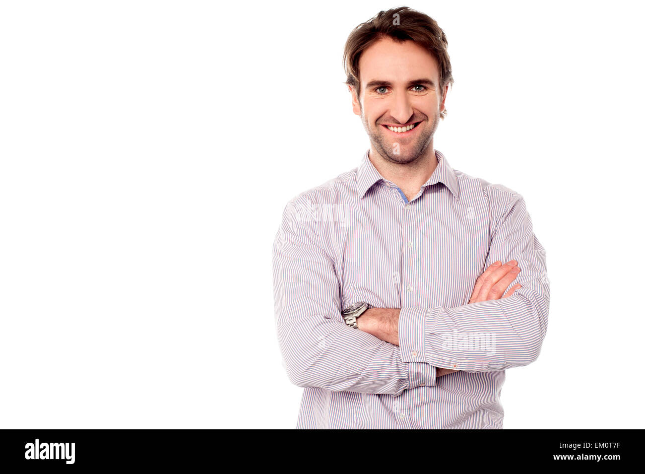 Happy smart guy posing with confidence Stock Photo - Alamy