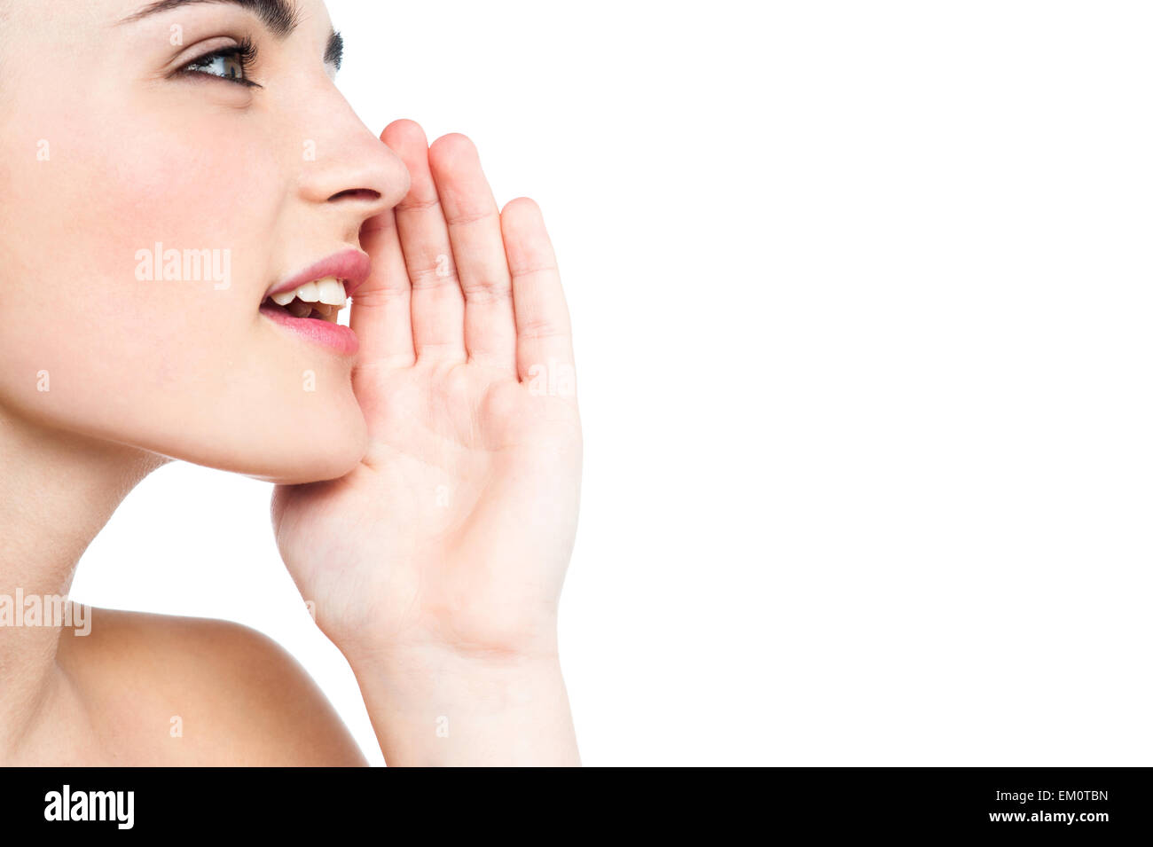 Young woman talking gossip Stock Photo - Alamy