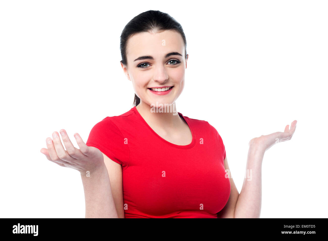 Beautiful girl wearing bright red top Stock Photo - Alamy