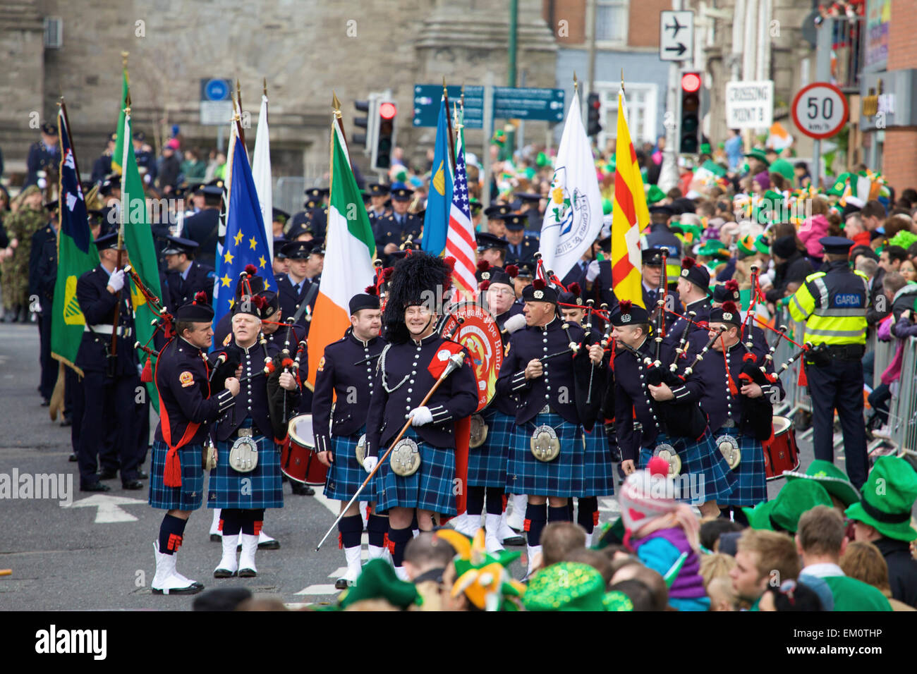 A Scottish Group Wearing Kilts And Carrying Flags For The Saint Patrick ...