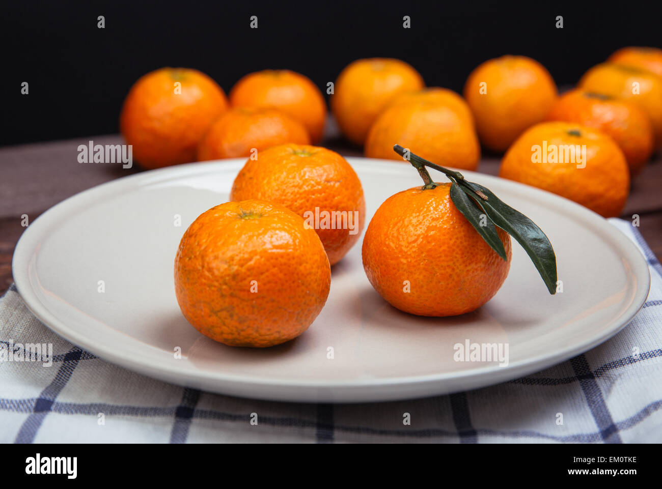 Three tangerines with leaves hi-res stock photography and images - Alamy
