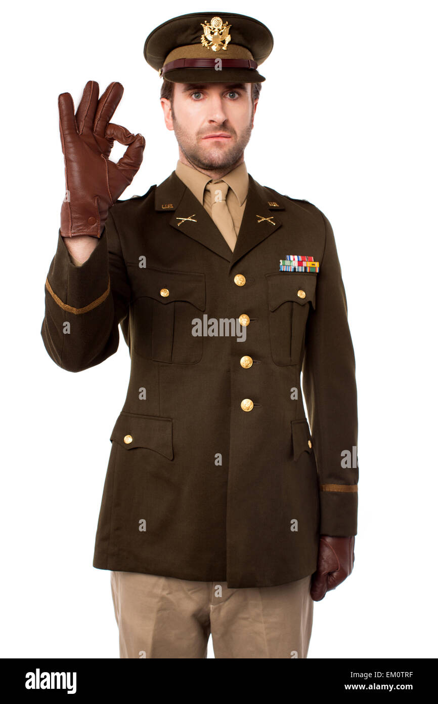 Captain gesturing okay sign. We are all safe Stock Photo - Alamy