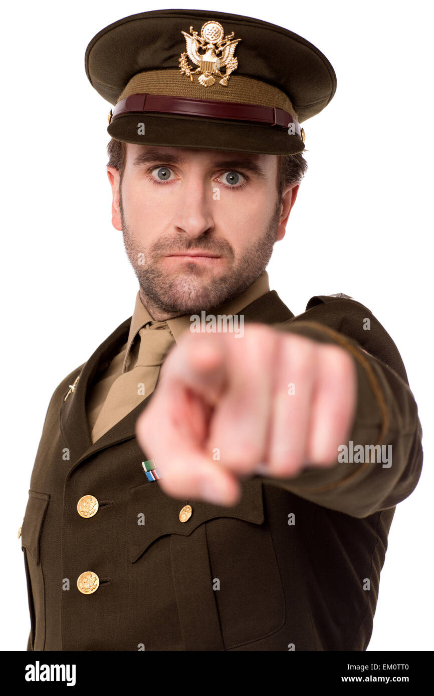 Young soldier pointing towards camera Stock Photo - Alamy