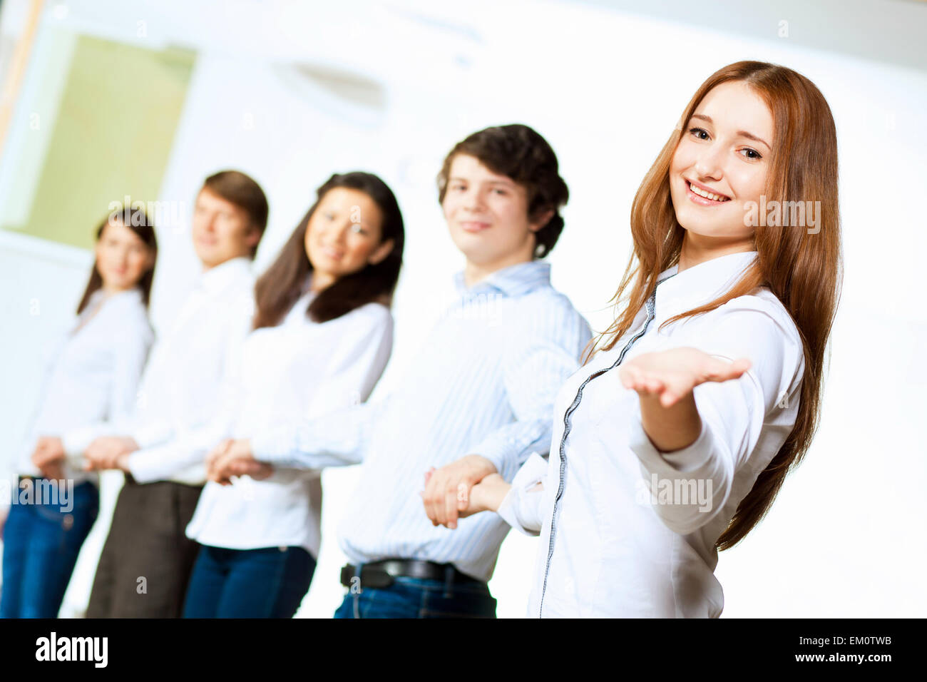 Five students smiling Stock Photo - Alamy