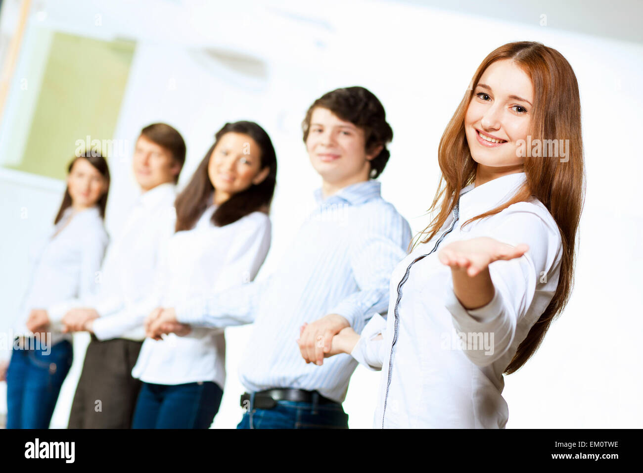 Five students smiling Stock Photo - Alamy