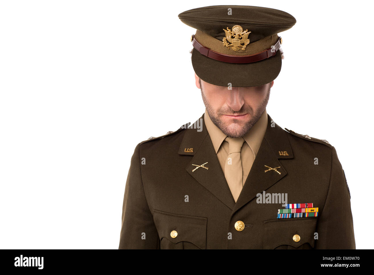 Army man looking down, filled with shame Stock Photo - Alamy