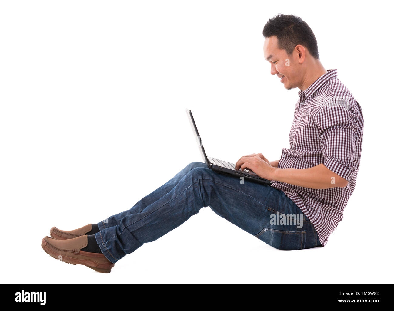 Asian man using laptop Stock Photo - Alamy