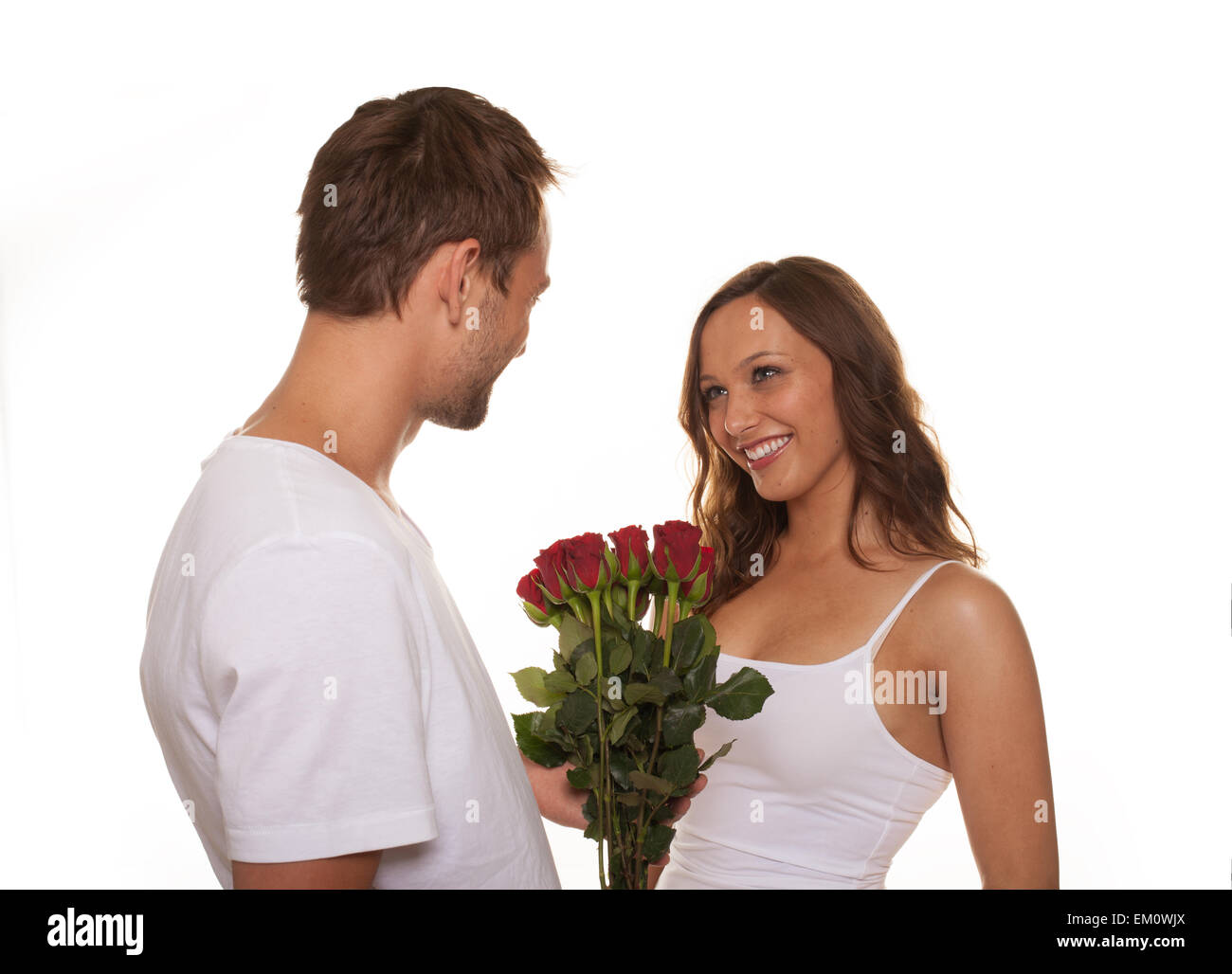 Boyfriend giving bunch of flowers to his girlfriend Stock Photo - Alamy
