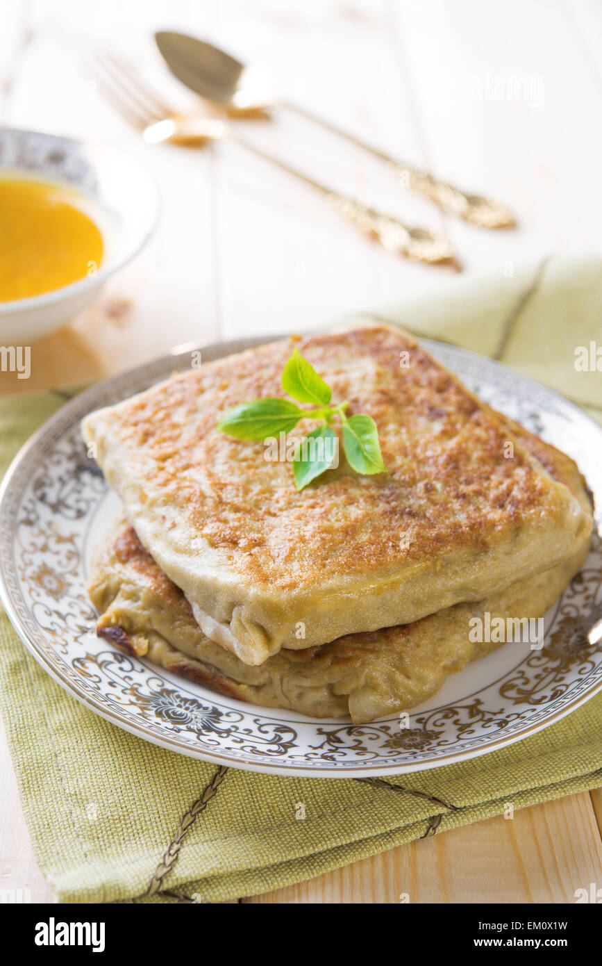 popular arab food Mutabbaq Stock Photo - Alamy